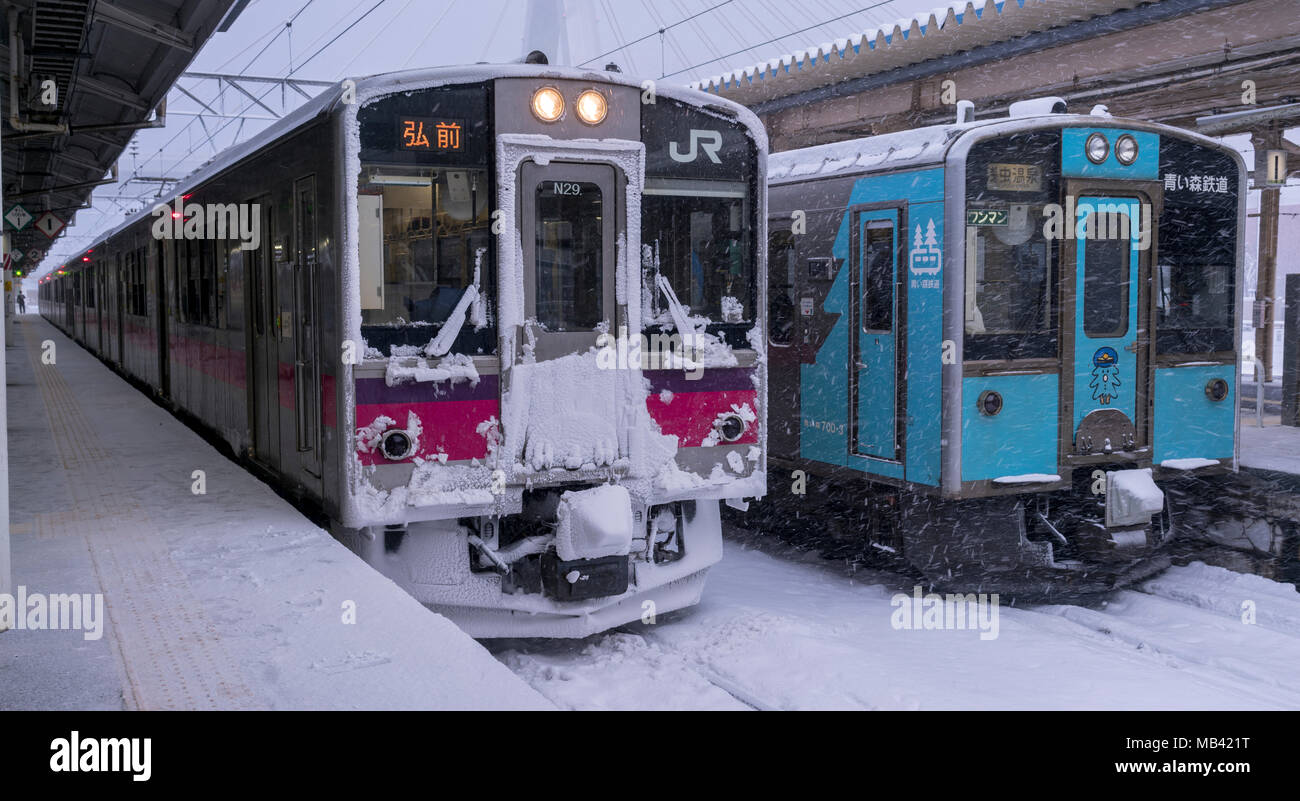 Japan Rail (JR East) and Aoimori Line trains in snow at Aomori Station ...