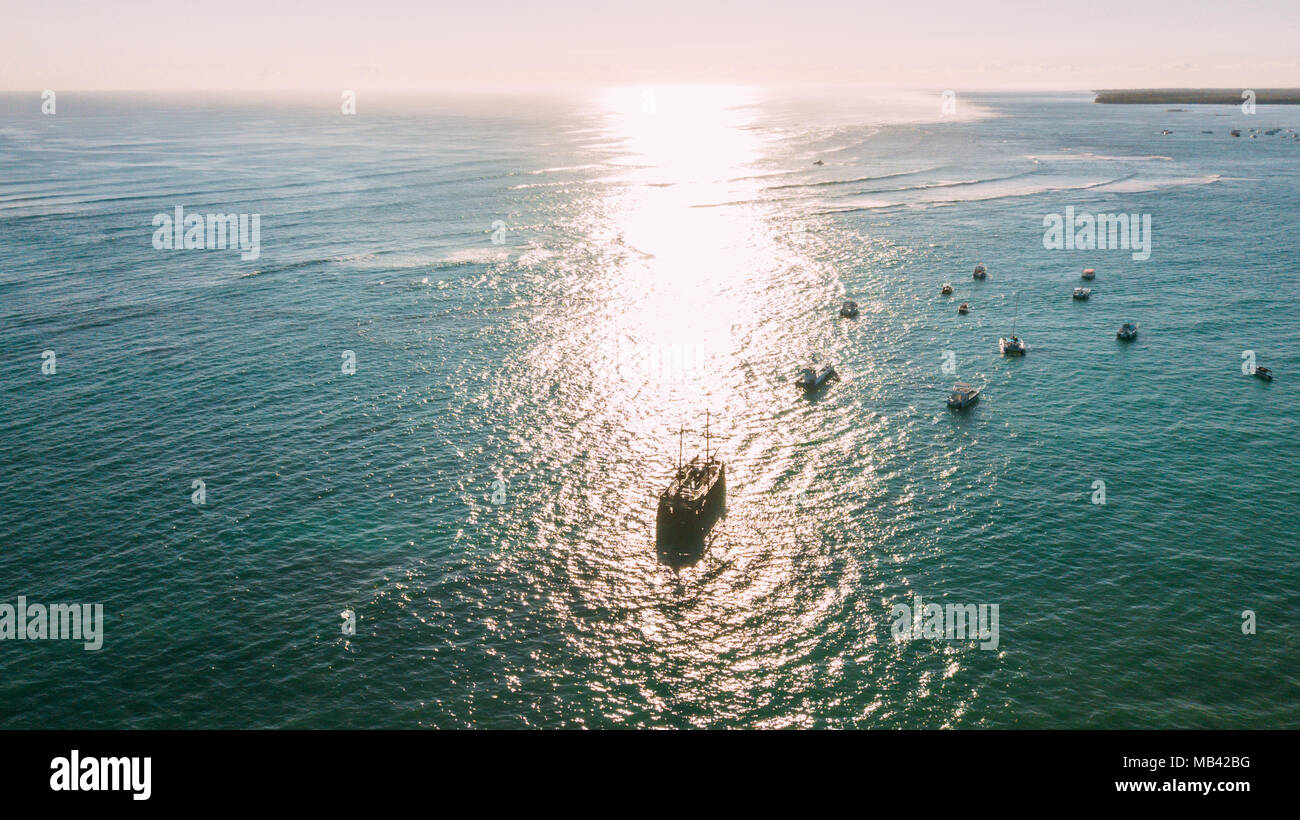The ship in a beam of the sun. Harbour ships Stock Photo - Alamy