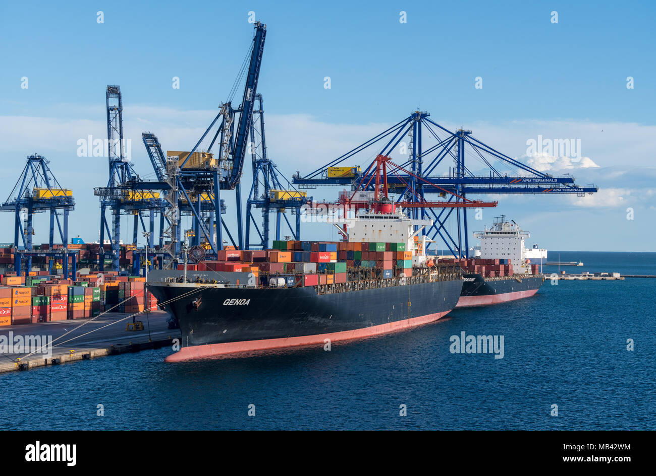 Containers being loaded onto ship in Valencia Stock Photo - Alamy