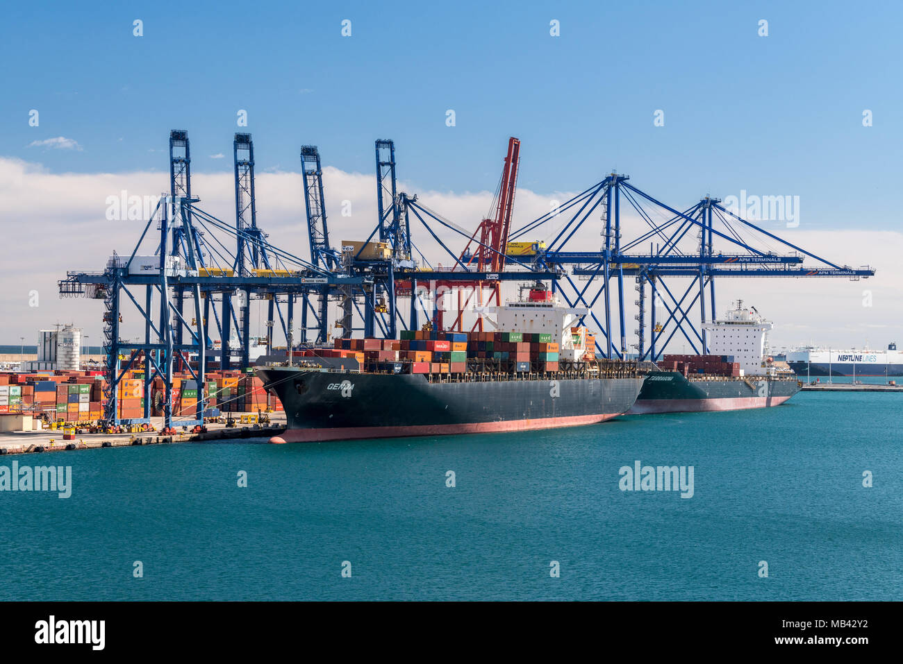 Containers being loaded onto ship in Valencia Stock Photo - Alamy