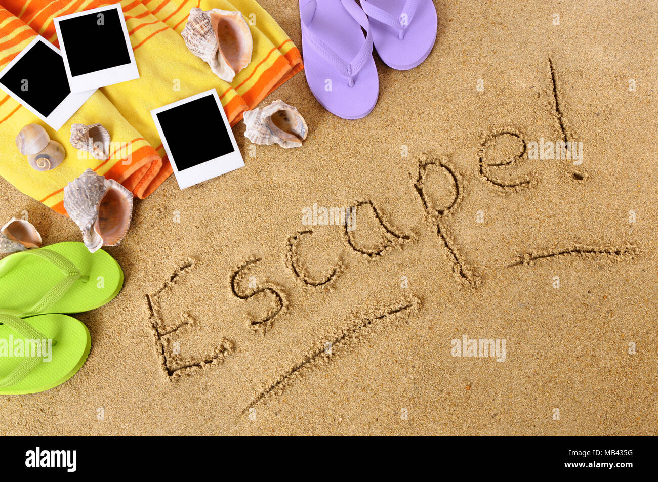 Beach background with towel, flip flops, blank photo prints and the ...