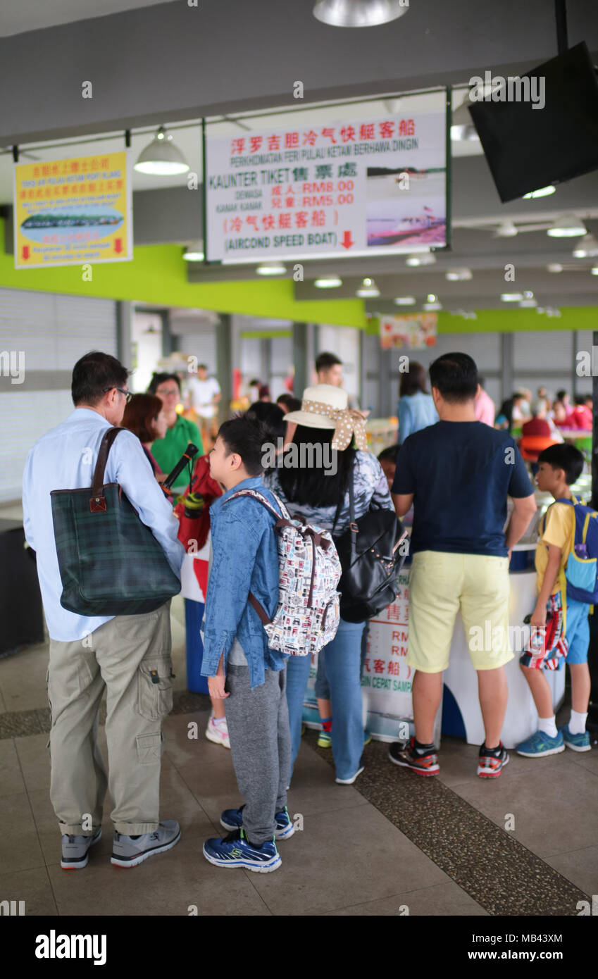 People queue up to buy ship ticket going to Crab Island, Malaysia Stock ...