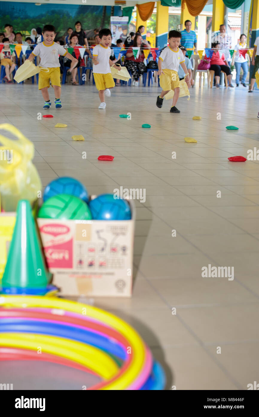 Balls, cone & hula hoops for the kindergarten sport day Stock Photo - Alamy