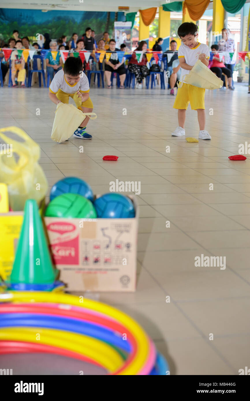 Balls, cone & hula hoops for the kindergarten sport day Stock Photo - Alamy
