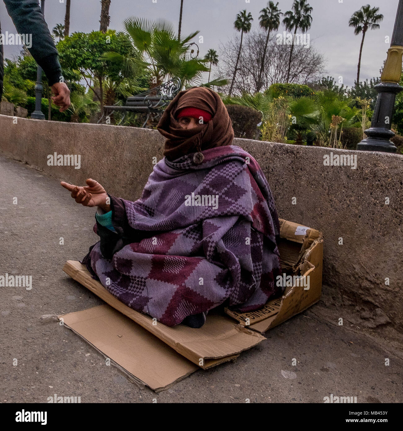 Muslim beggar hi-res stock photography and images - Alamy