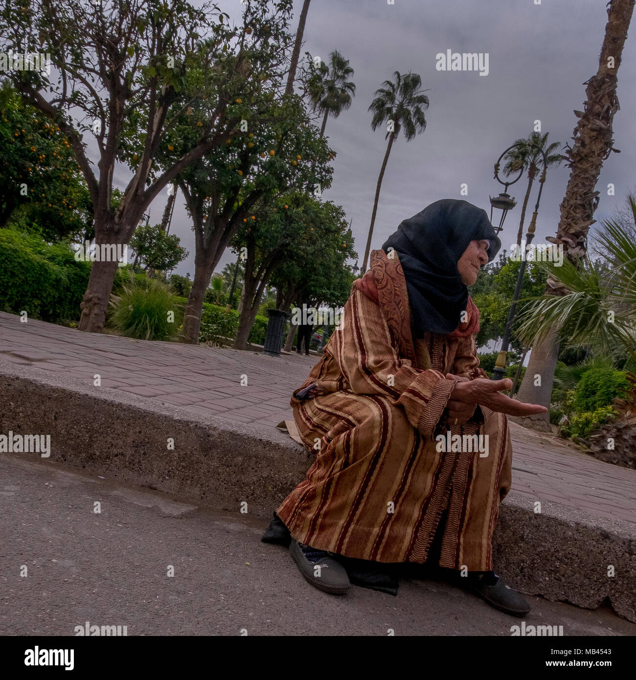 Muslim beggar hi-res stock photography and images - Alamy