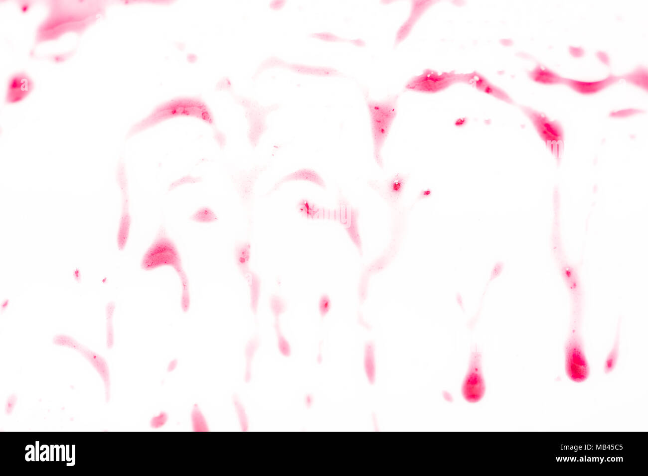 Raspberry jam spots and lines Stock Photo - Alamy