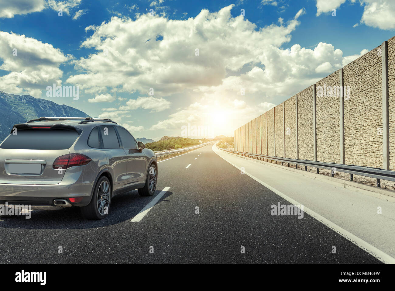Car on the high-speed highway Stock Photo - Alamy