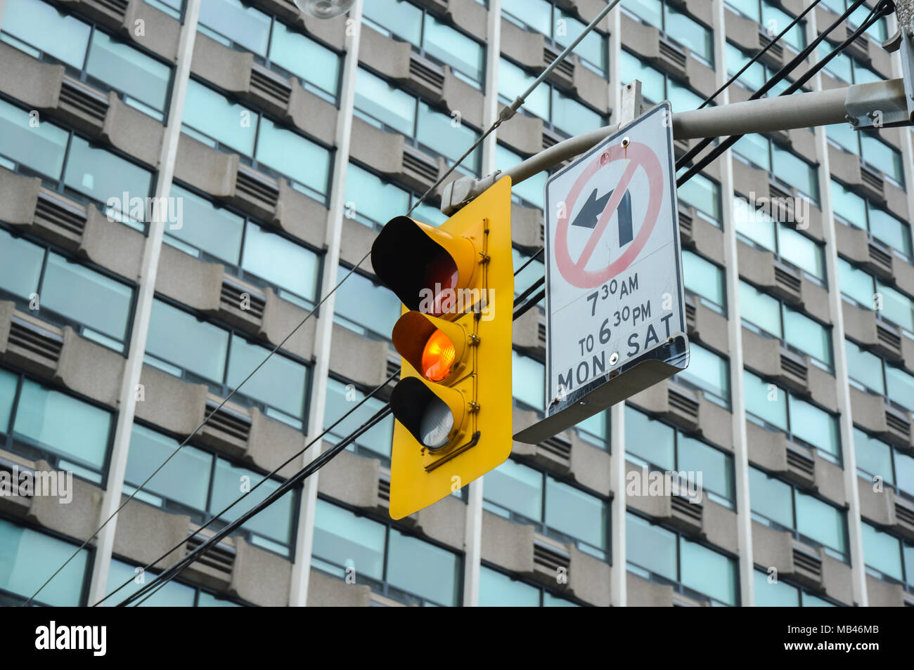 Traffic light in Toronto downtown, Canada. No turn sign Stock Photo - Alamy