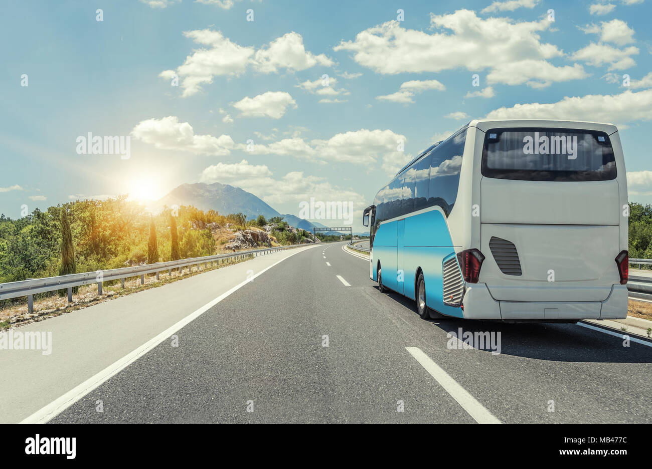 Bus rushes along the asphalt high-speed highway Stock Photo - Alamy