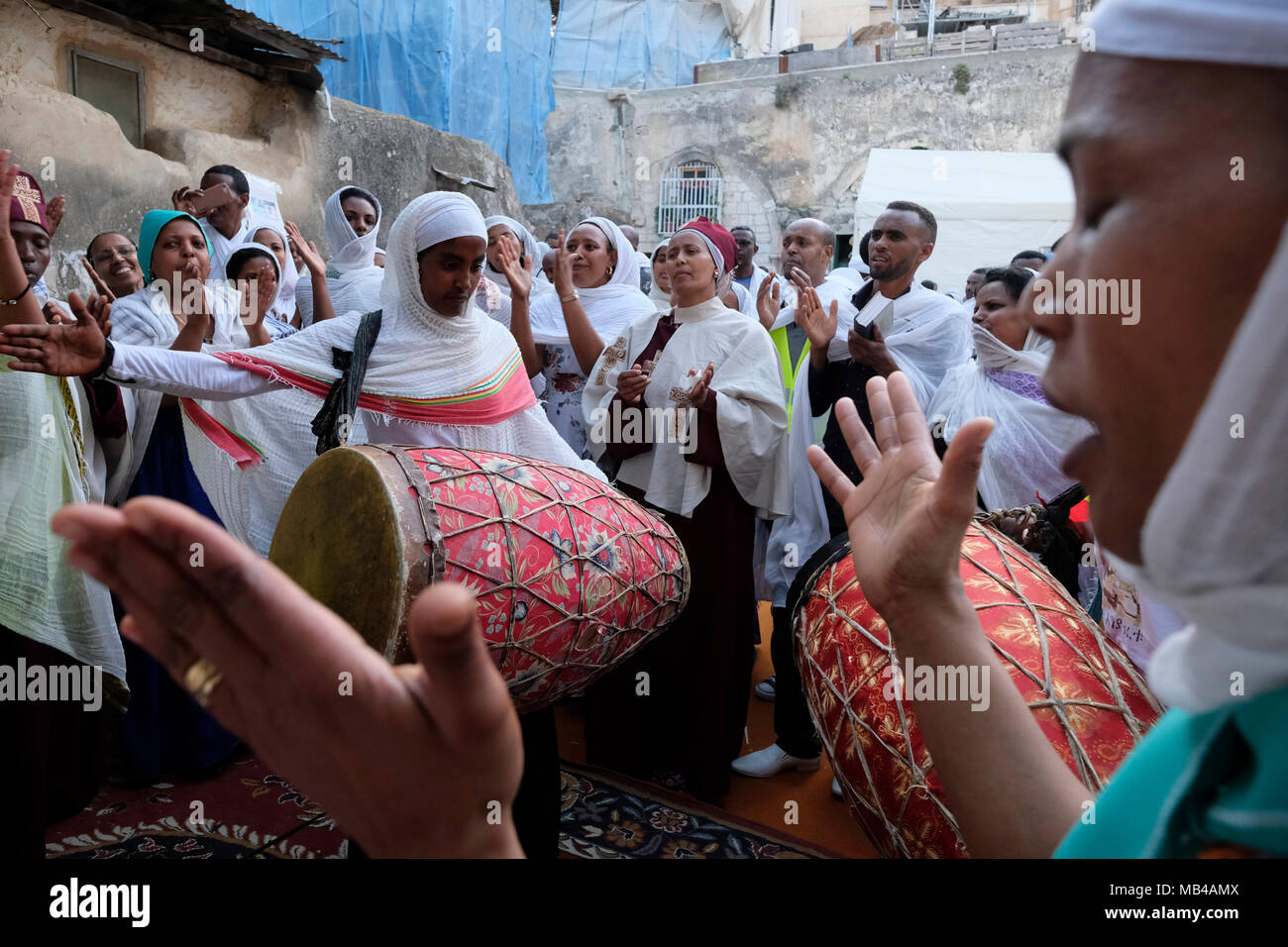 Ethiopian Orthodox Christian pilgrims play the Kebero a double-headed ...