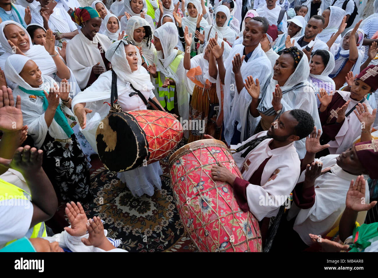 Ethiopian Orthodox Christian pilgrims play the Kebero a double-headed ...