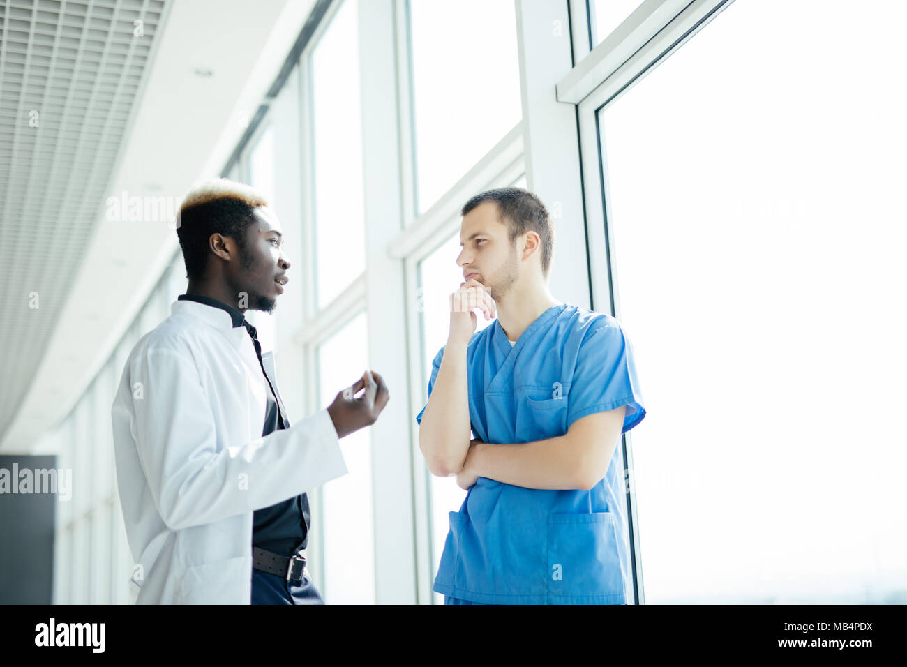 Doctor two nurses in hospital hi-res stock photography and images - Alamy