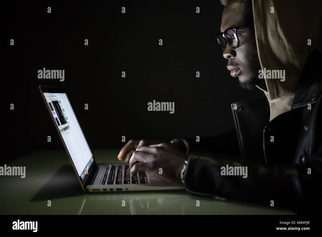 Hacker attack the server in the dark. Afro american hacker hack server ...