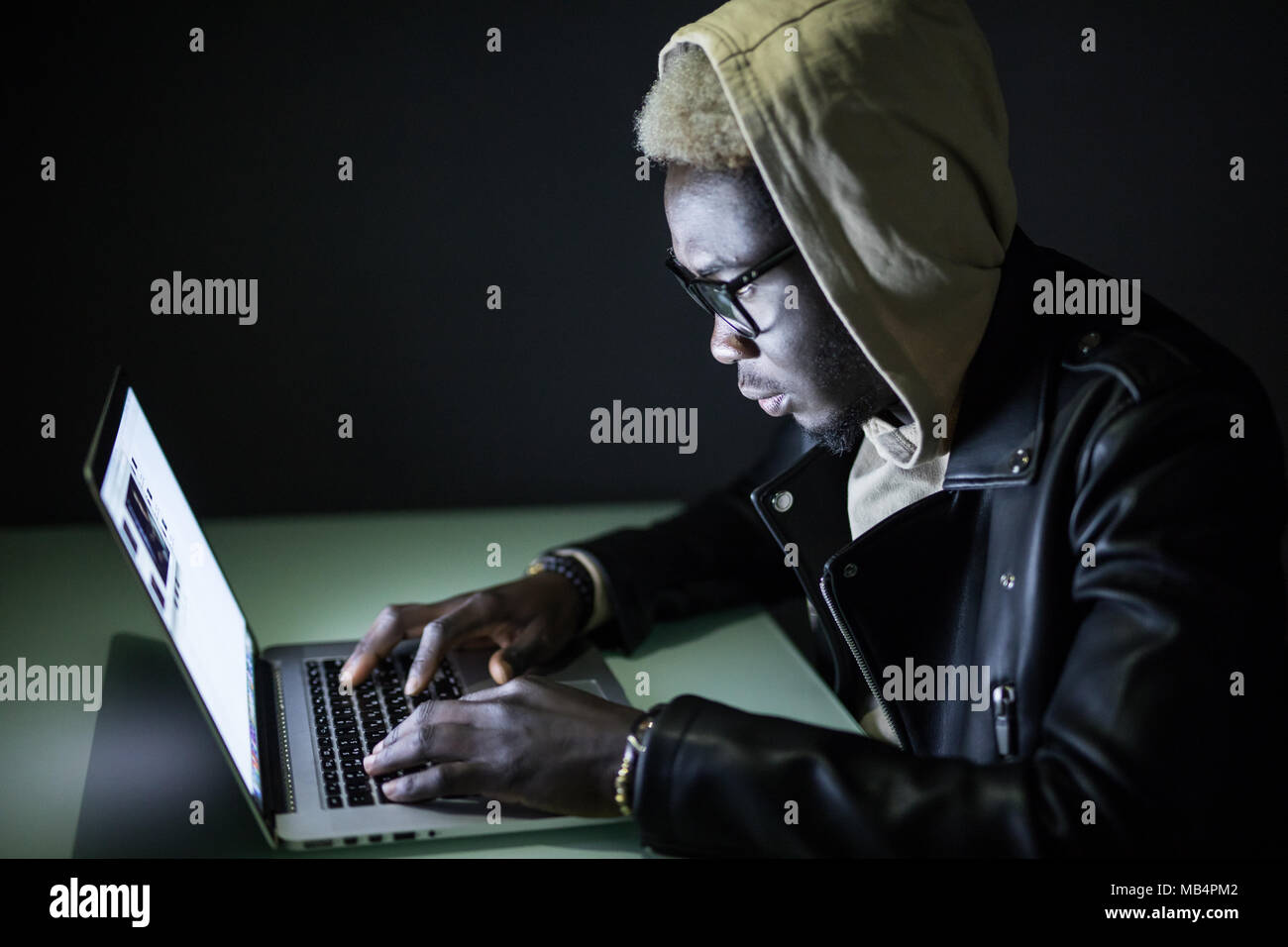 Unidentified man computer hi-res stock photography and images - Alamy