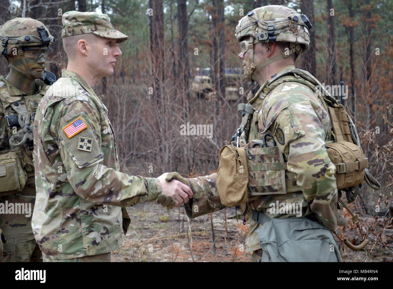 First Sgt. Joey Blacksher (right), assigned to Headquarters and ...