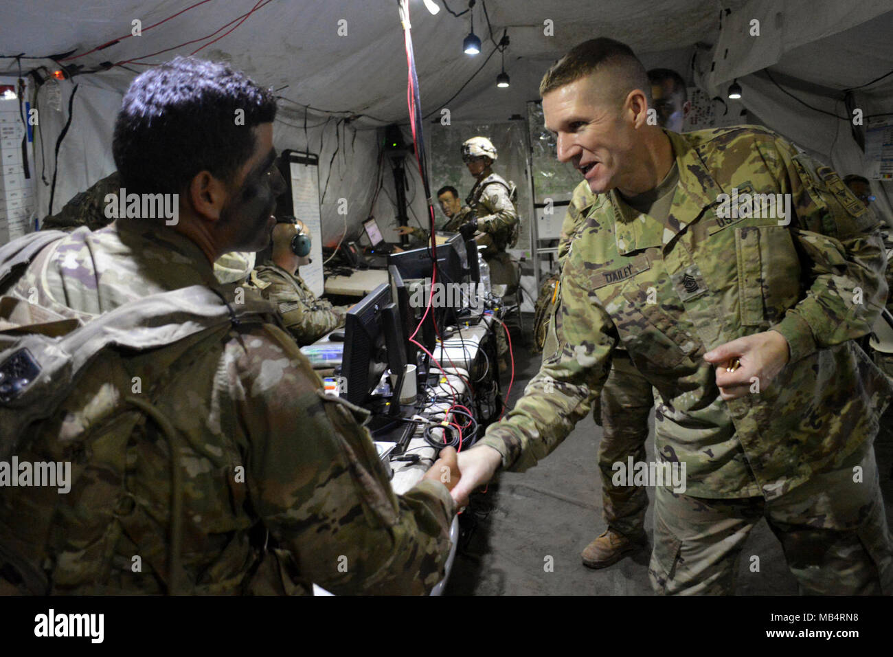 Sgt. 1st Class Luis Roman (left), assigned to Headquarters and ...
