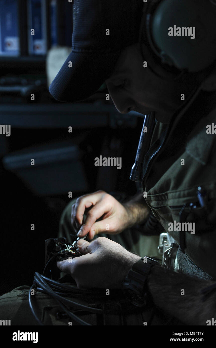 A Royal Canadian Air Force 436th Transport Squadron crewmember repairs ...