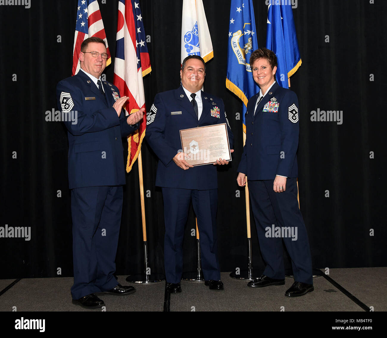 Command Chief Master Sgt. Thomas A. Jones, left, the state command ...