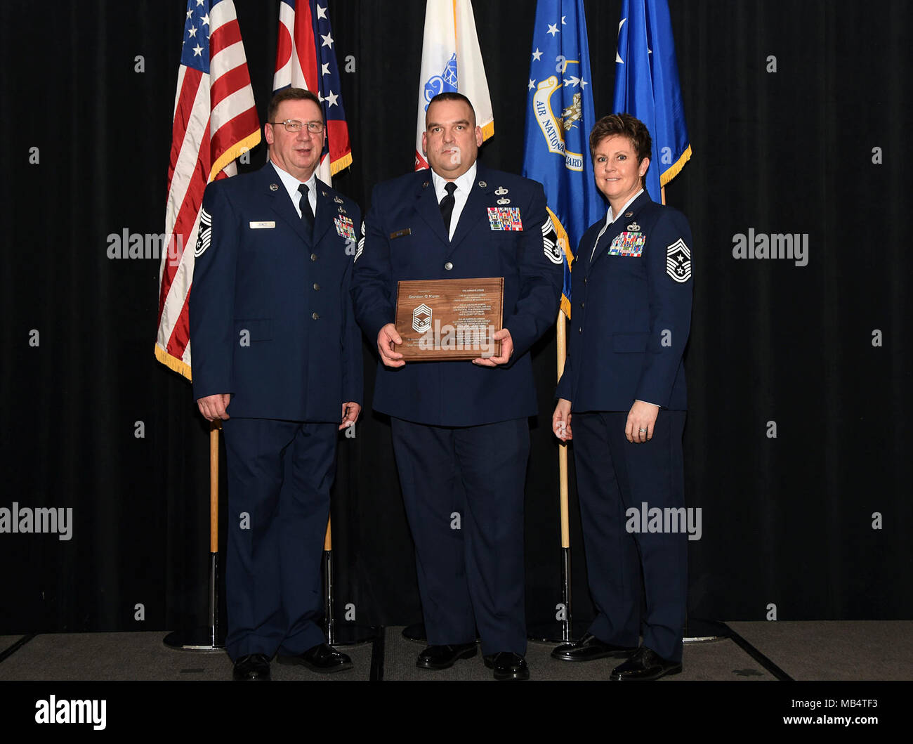 Command Chief Master Sgt. Thomas A. Jones, left, the state command ...