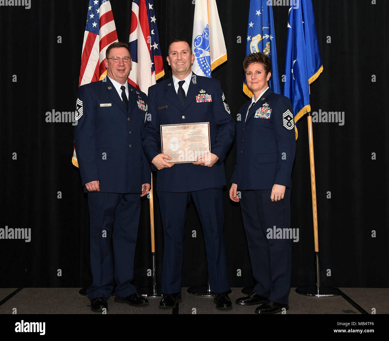 Command Chief Master Sgt. Thomas A. Jones, left, the state command ...