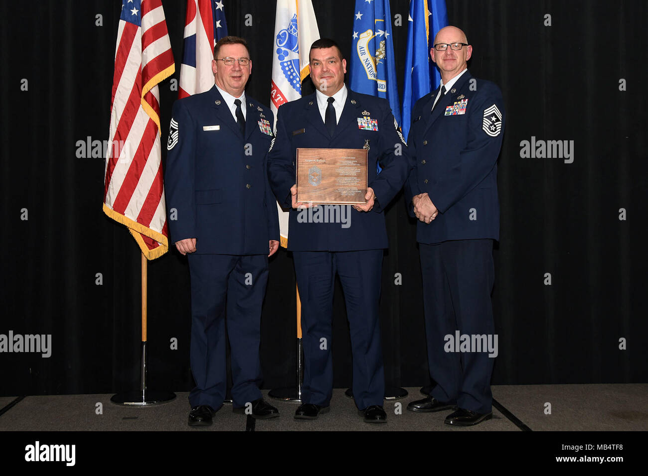 Command Chief Master Sgt. Thomas A. Jones, left, the state command ...