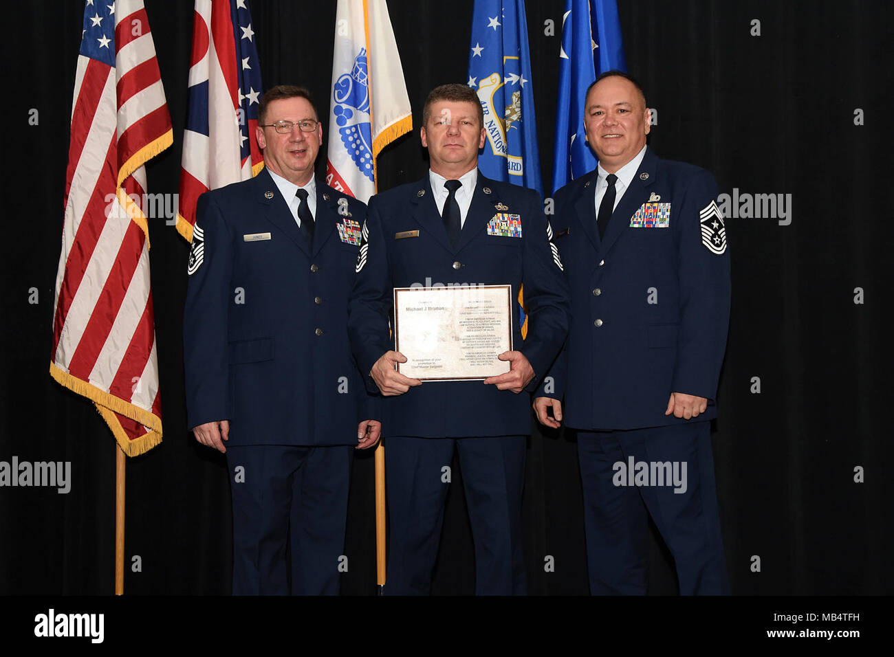 Command Chief Master Sgt. Thomas A. Jones, left, the state command ...