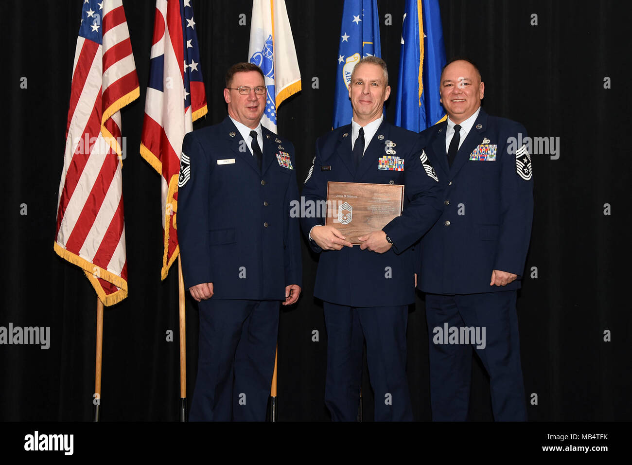 Command Chief Master Sgt. Thomas A. Jones, left, the state command ...