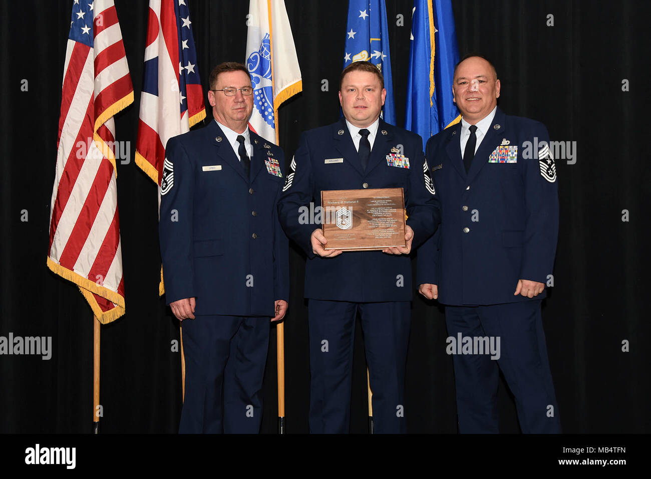 Command Chief Master Sgt. Thomas A. Jones, left, the state command ...