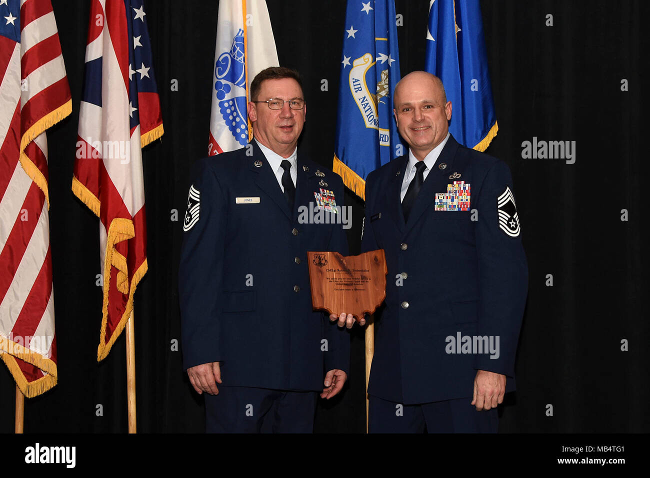 Command Chief Master Sgt. Thomas A. Jones, left, the state command ...