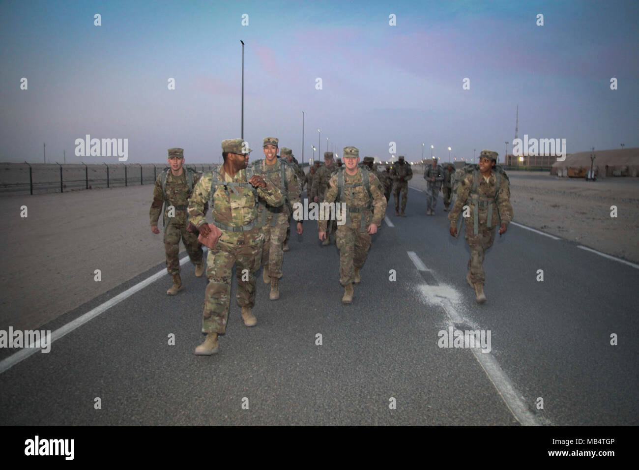 U.S. Army Soldiers from the 160th Signal Brigade conduct a 4 mile ruck ...