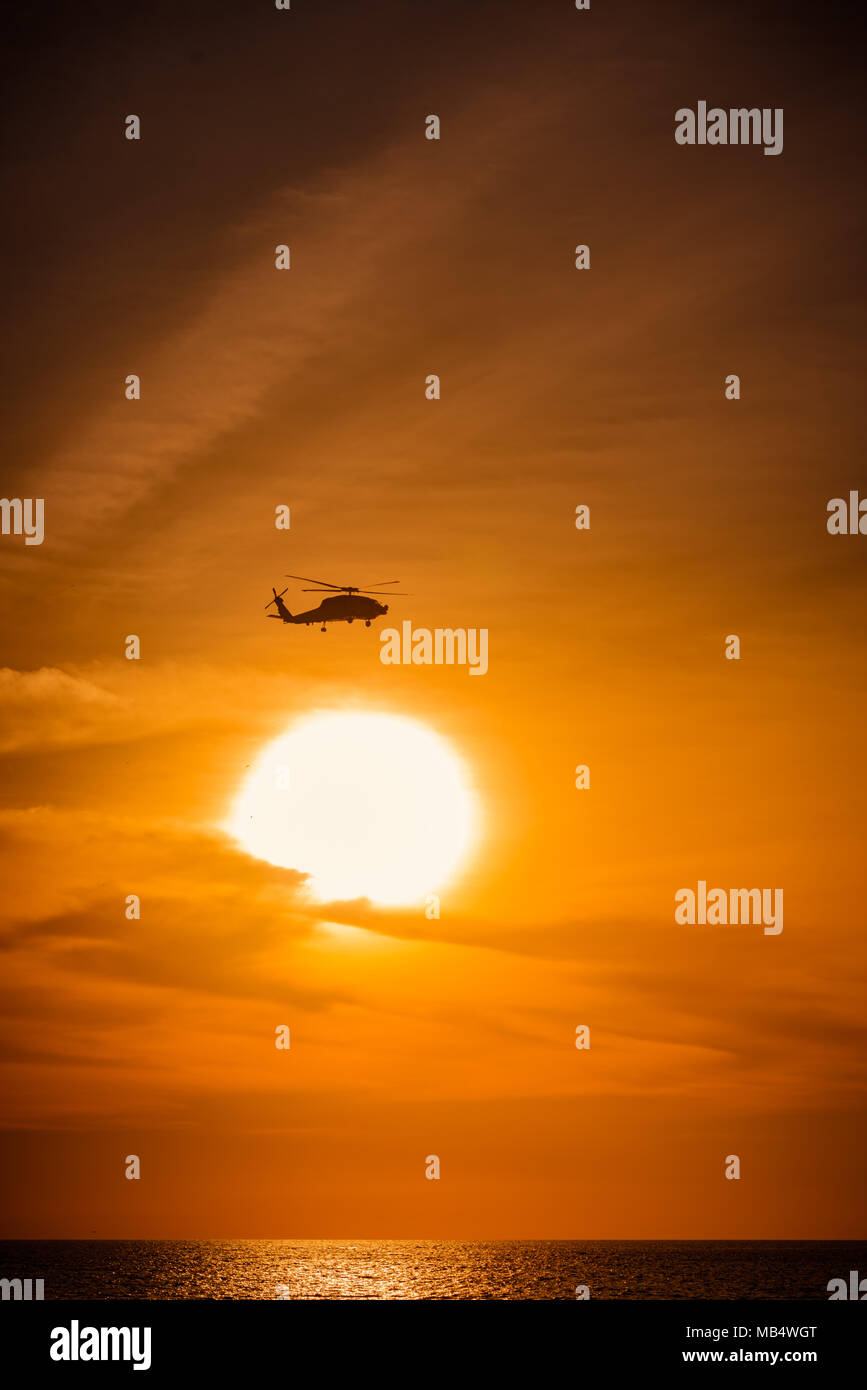 Helicopter flying over harbour hi-res stock photography and images - Alamy
