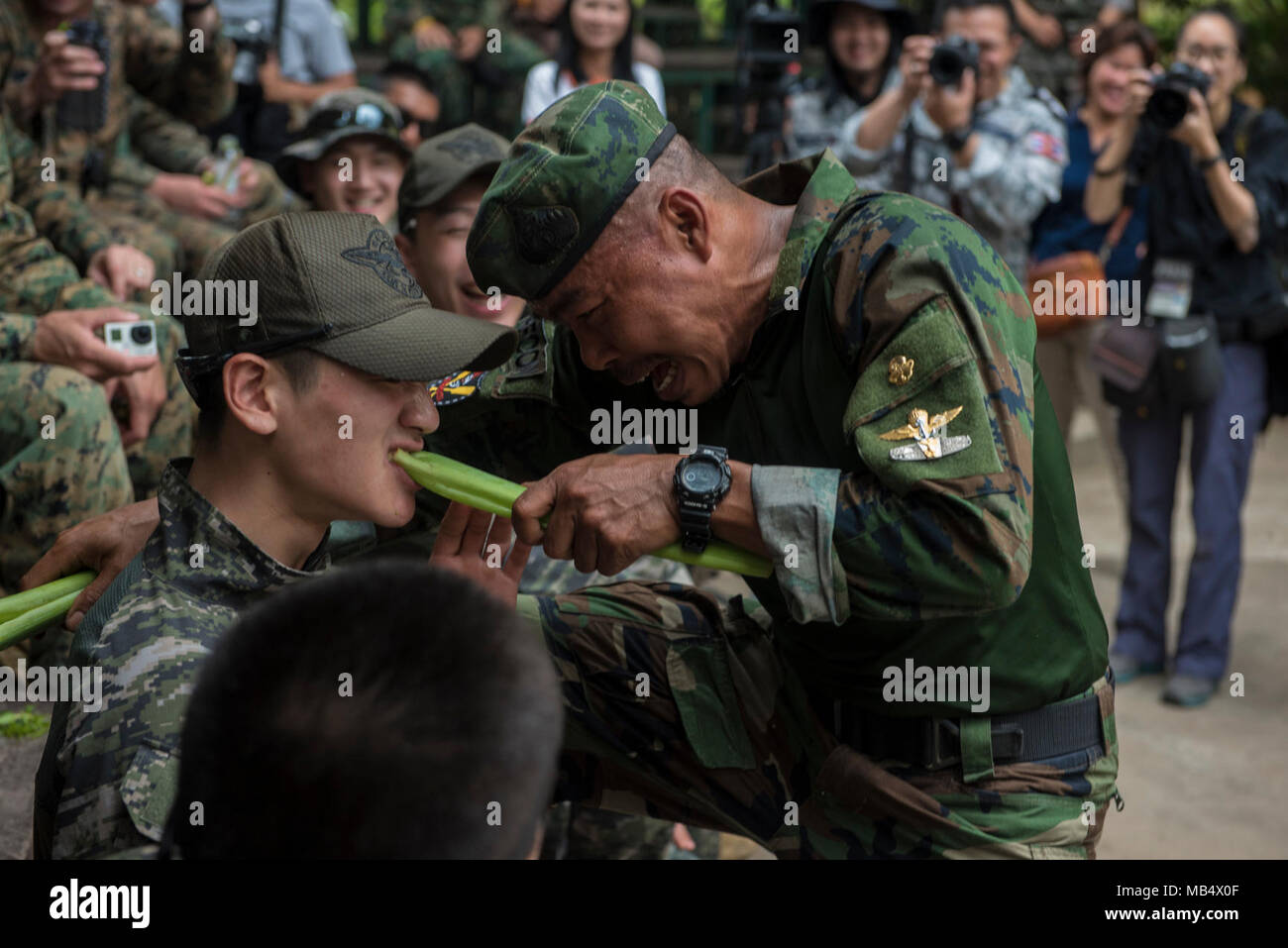 Royal Thai Marine Corps Sgt. Maj. Chaiwat Lodsin, right, a jungle ...