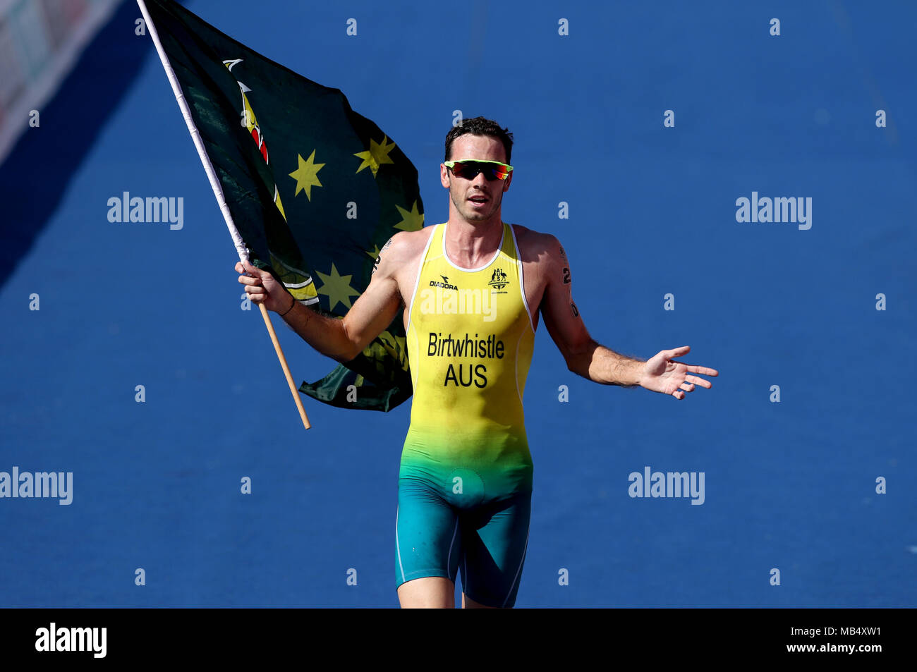 Australia's Jacob Birtwhistle crosses the finish line to take gold ...