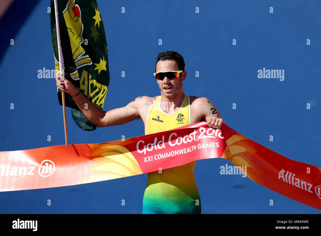 Australia's Jacob Birtwhistle crosses the finish line to take gold ...