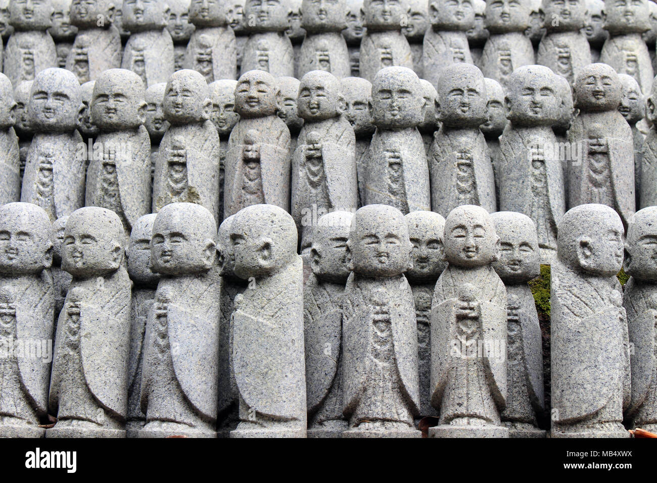 The statues of Buddha "Jizo", that found in many temples in Japan ...