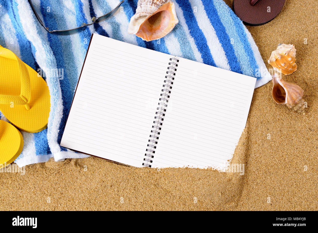 Beach background with towel, flip flops and blank notebook Stock Photo ...