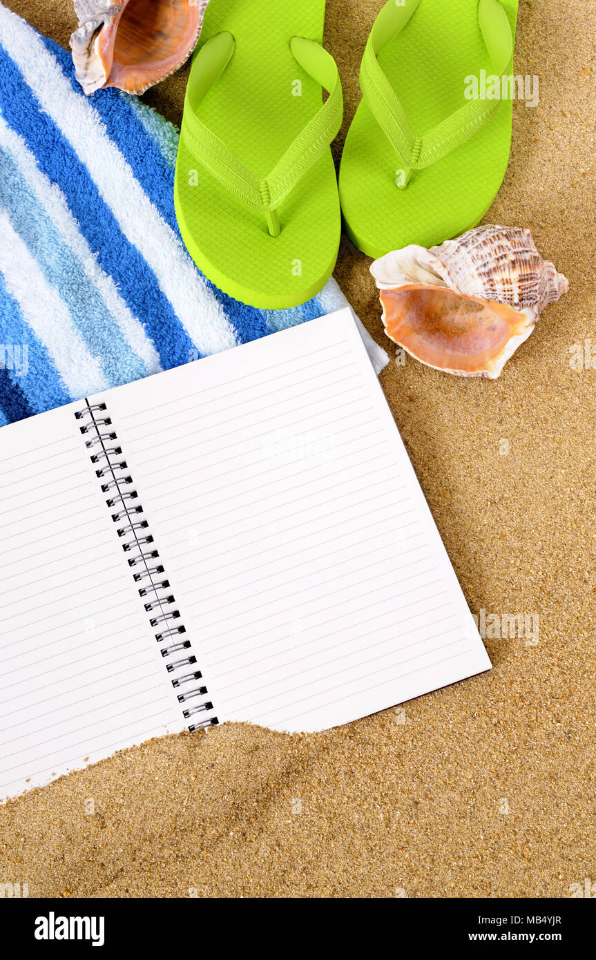 Beach background with towel, flip flops and blank notebook Stock Photo ...