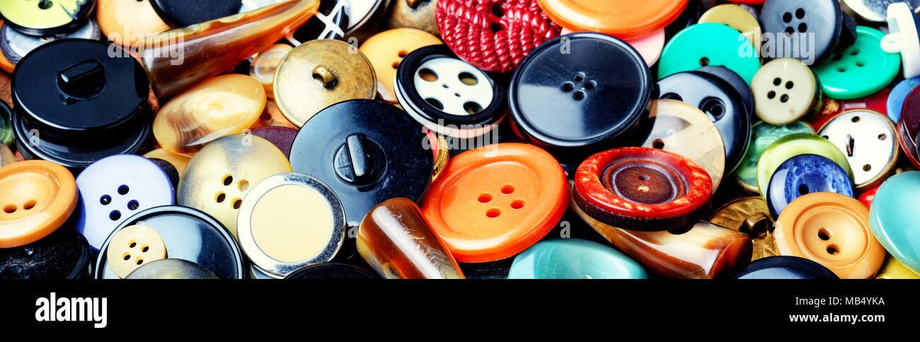 Large mix of plastic buttons for clothing.Background made of buttons ...