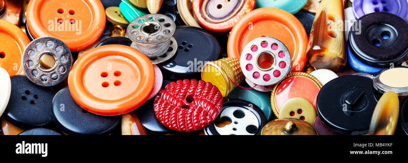Large mix of plastic buttons for clothing.Background made of buttons ...