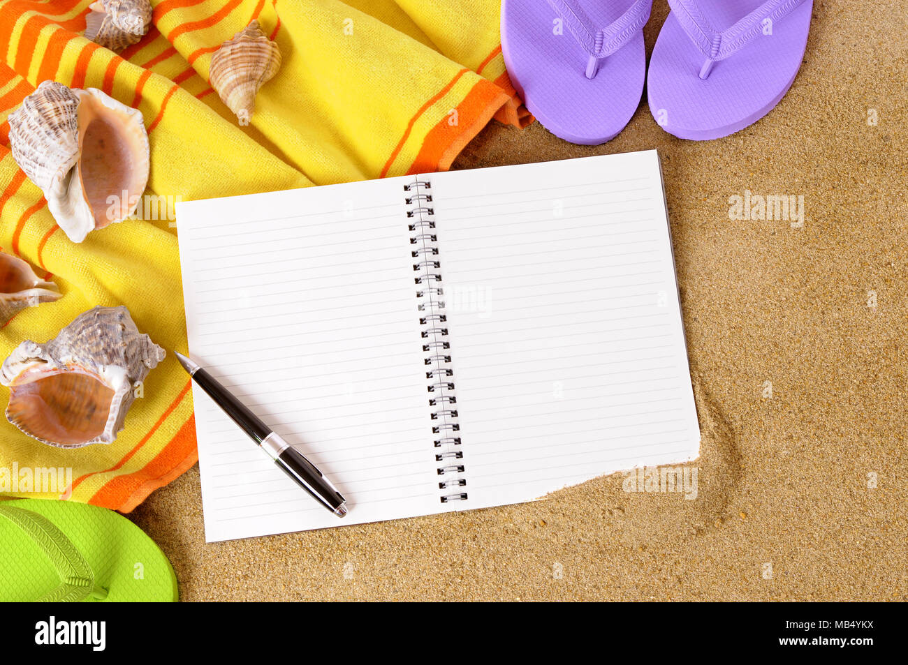 Beach background with towel, flip flops and blank writing book Stock ...