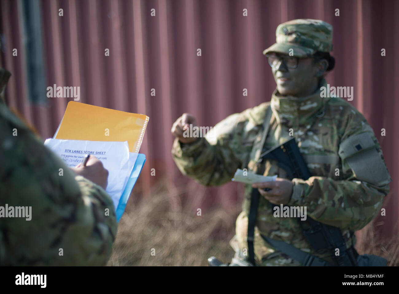 A U.S. Army Soldier rates Spc. Sandra Cruz, assigned to the Schinnen ...