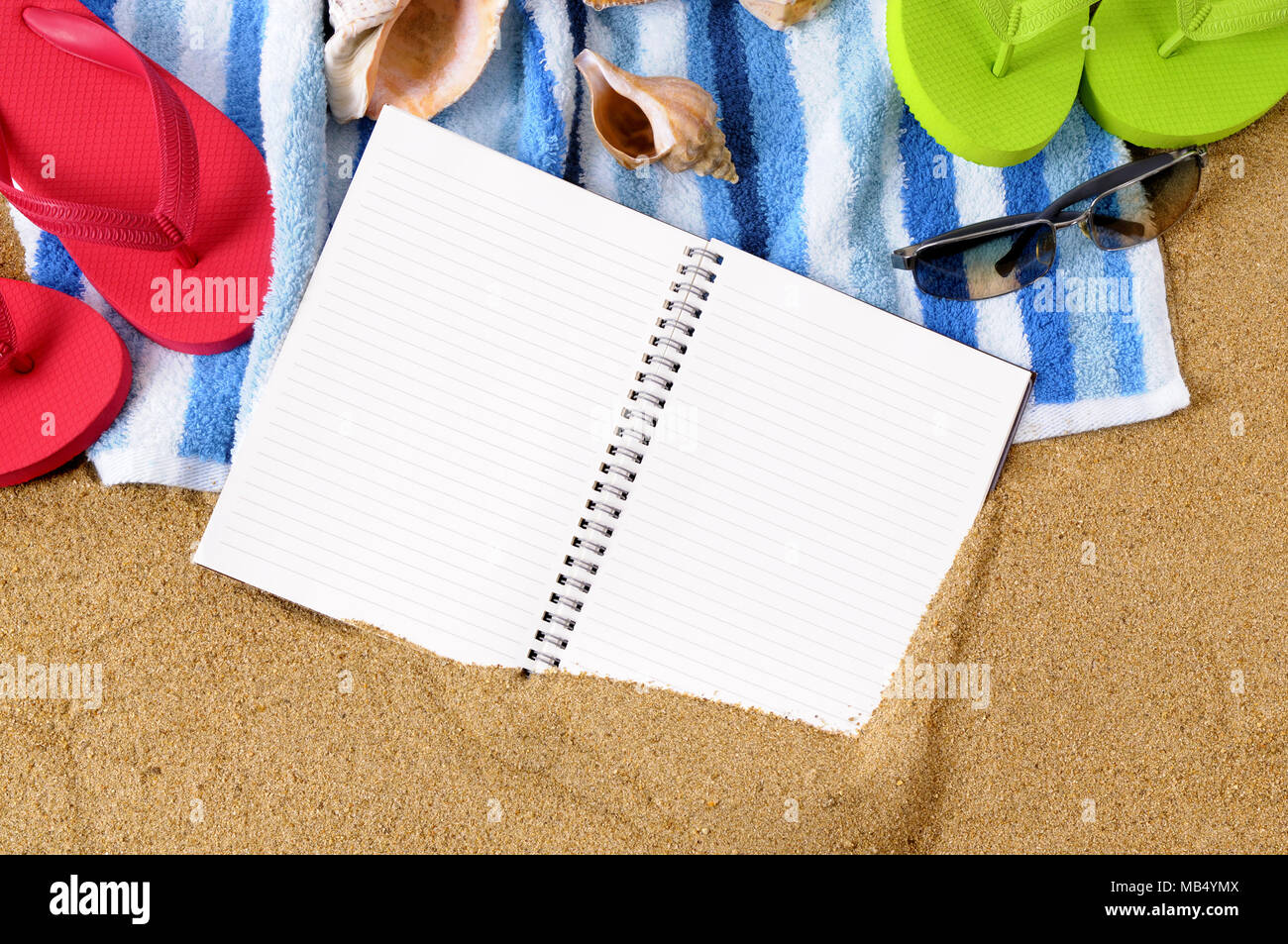Beach background with towel, flip flops and blank notebook Stock Photo ...