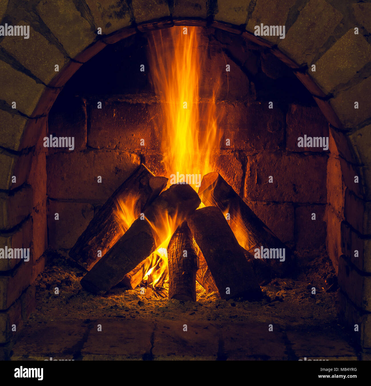 A fire burns in a fireplace Stock Photo - Alamy