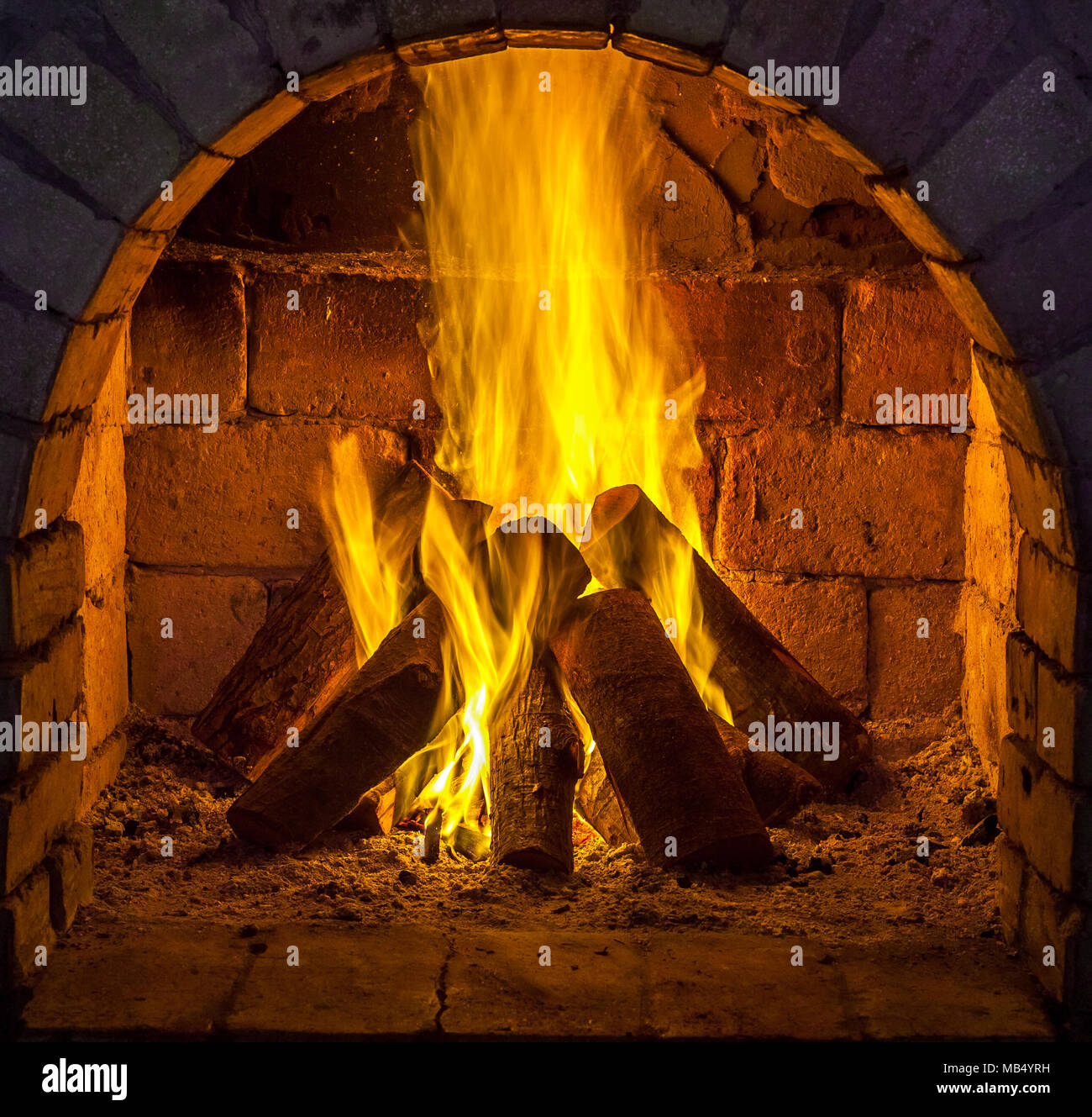 A fire burns in a fireplace Stock Photo - Alamy