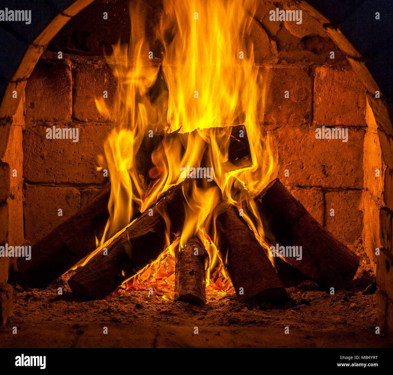 A fire burns in a fireplace Stock Photo - Alamy