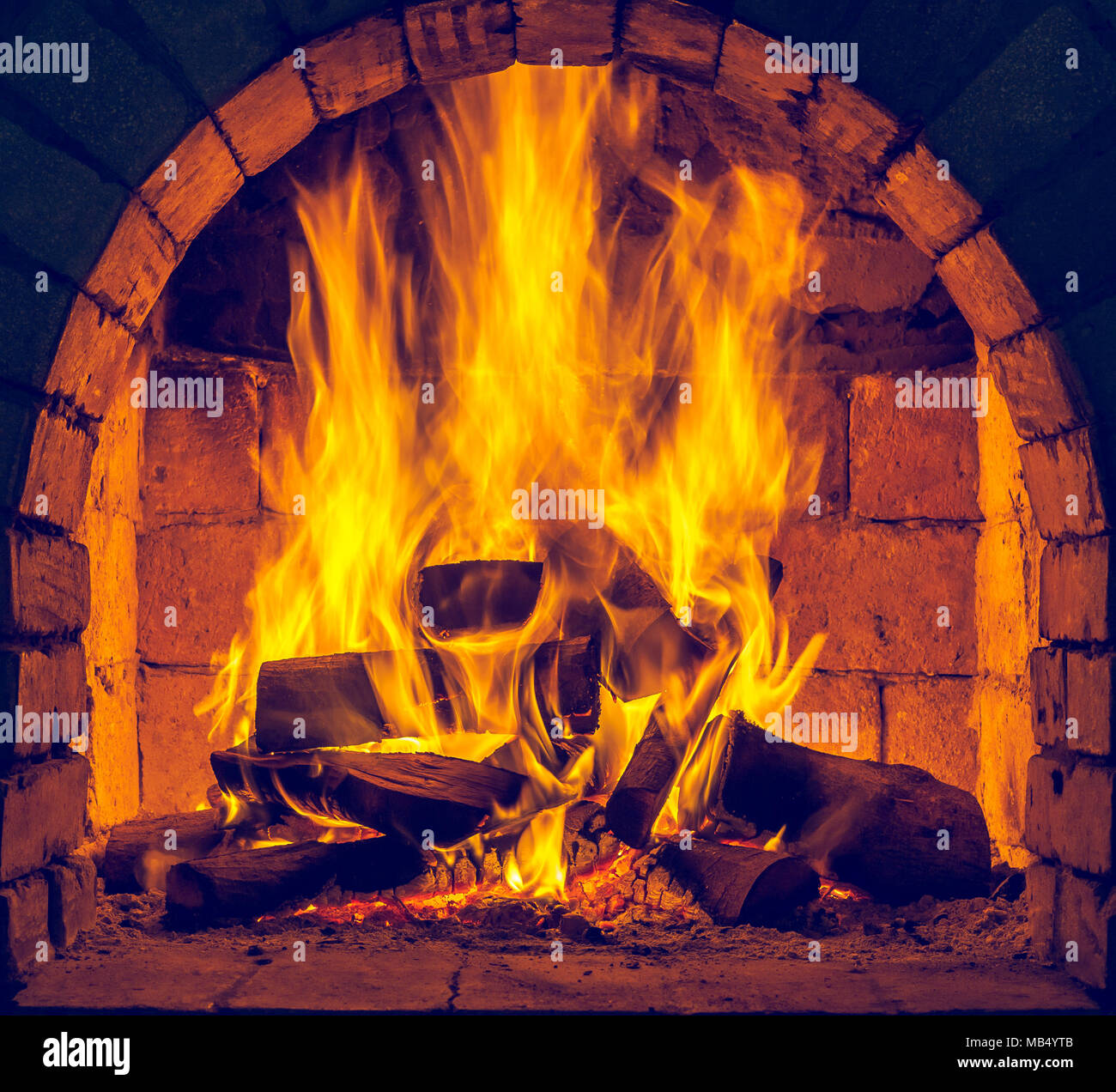 A fire burns in a fireplace Stock Photo - Alamy