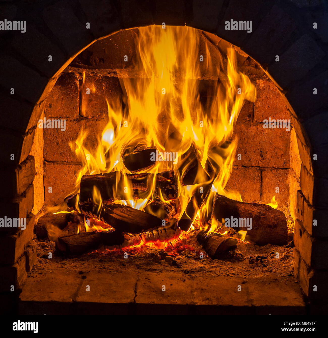 A fire burns in a fireplace Stock Photo - Alamy