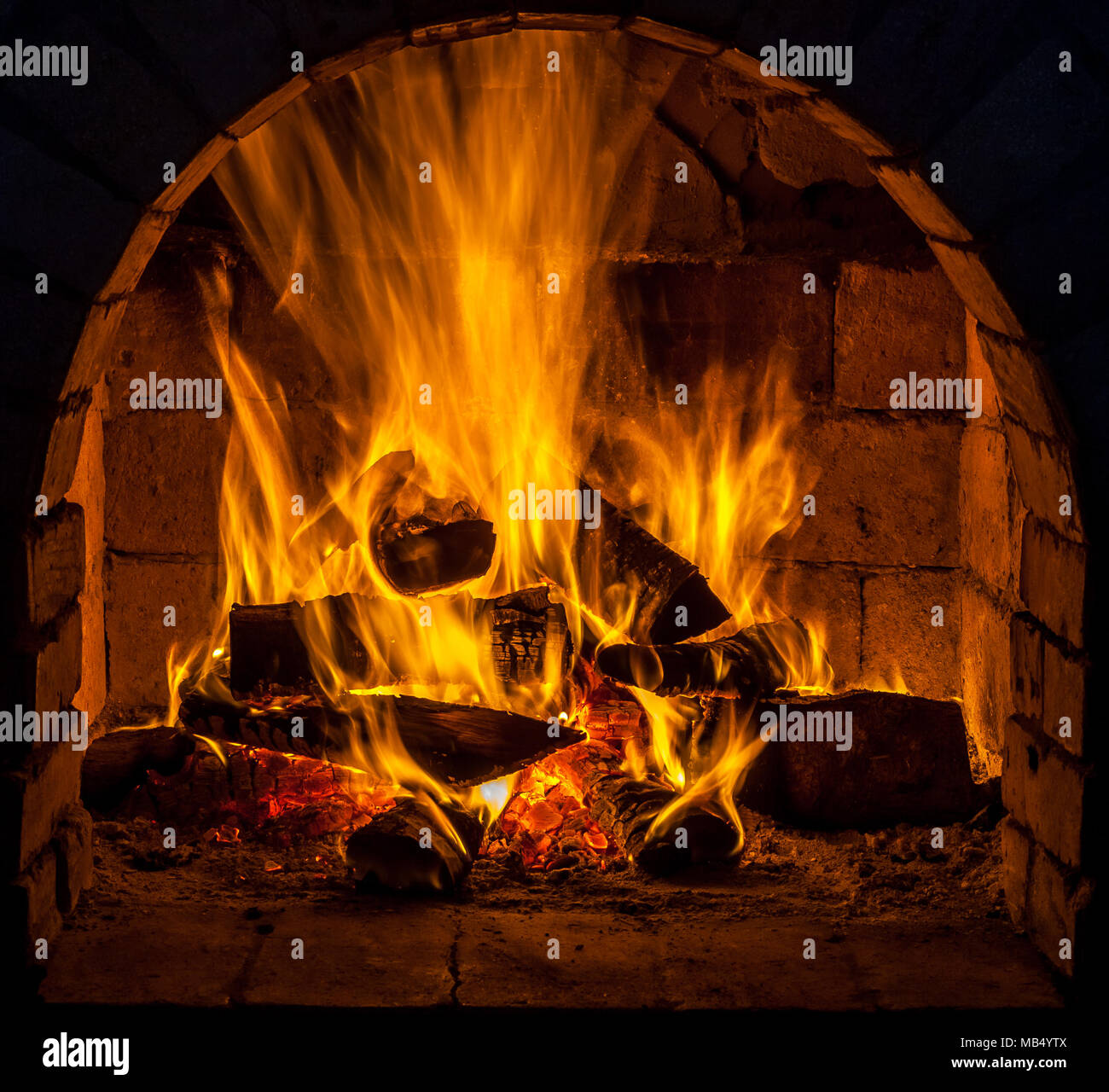 A fire burns in a fireplace Stock Photo - Alamy