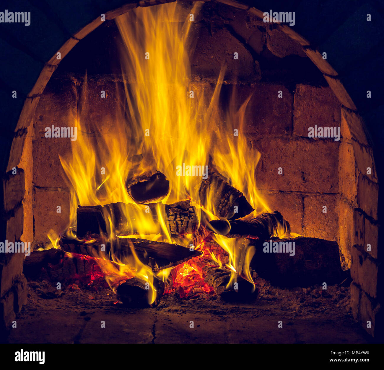 A fire burns in a fireplace Stock Photo - Alamy